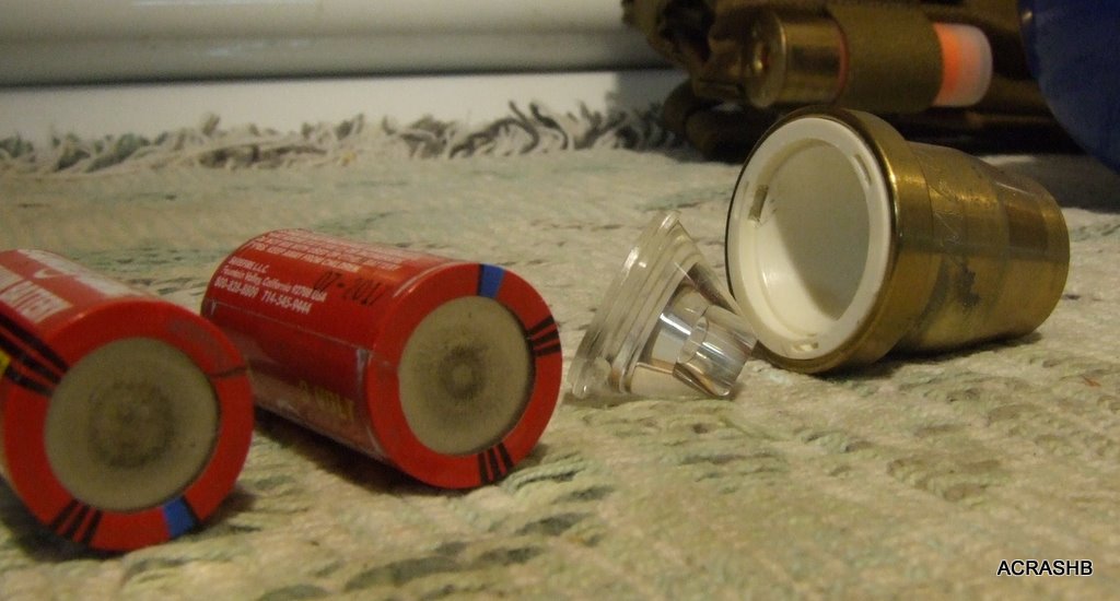 Malkoff M61 in Surefire 618 shotgun light | Candle Power Flashlight Forum